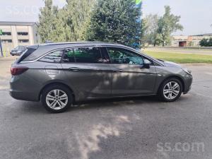Grey Opel Astra 2016 in Riga, with an engine capacity of 1.60 L and mileage of 128 thousand km for 5250 €, photo 7 on AUTOMOTO.COM.LV