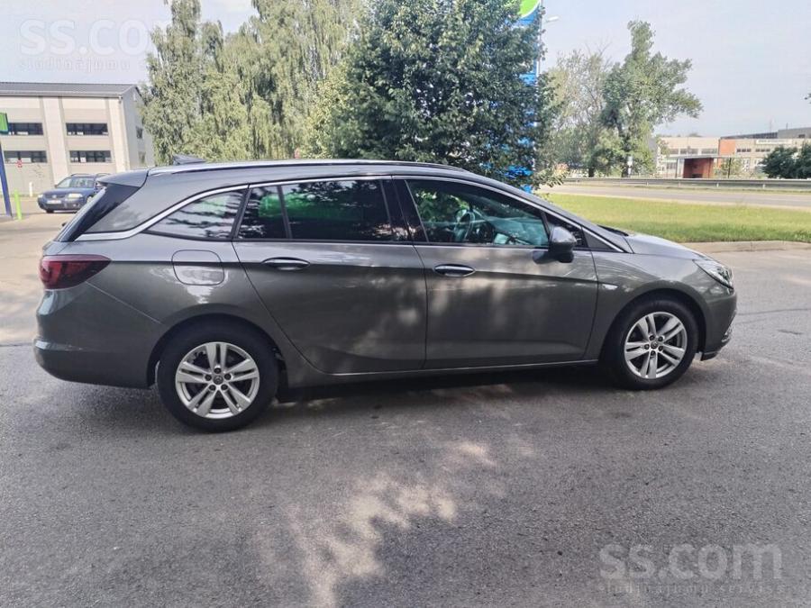 Grey Opel Astra 2016 in Riga, with an engine capacity of 1.60 L and mileage of 128 thousand km for 5250 €, photo 7 on AUTOMOTO.COM.LV