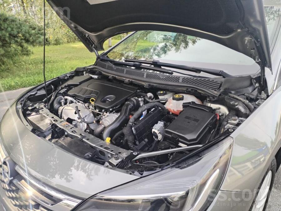 Grey Opel Astra 2016 in Riga, with an engine capacity of 1.60 L and mileage of 128 thousand km for 5250 €, photo 11 on AUTOMOTO.COM.LV
