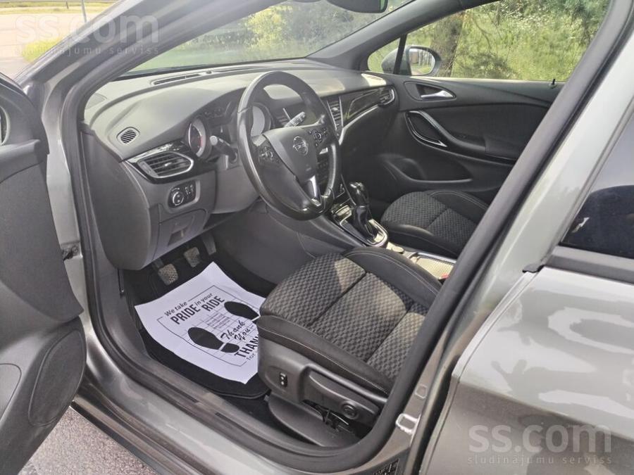 Grey Opel Astra 2016 in Riga, with an engine capacity of 1.60 L and mileage of 128 thousand km for 5250 €, photo 16 on AUTOMOTO.COM.LV