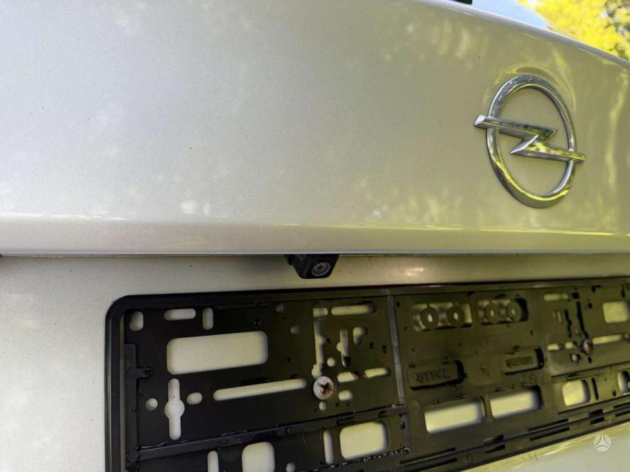Grey Opel Astra 2016 in Kretinga, with an engine capacity of 1.60 L and mileage of 230 thousand km for 5800 €, photo 12 on AUTOMOTO.COM.LV