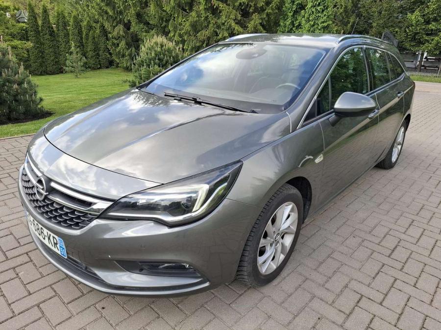 Grey Opel Astra 2016 in Kaunas, with an engine capacity of 1.60 L and mileage of 249 thousand km for 4900 €, photo 3 on AUTOMOTO.COM.LV