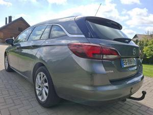 Grey Opel Astra 2016 in Kaunas, with an engine capacity of 1.60 L and mileage of 249 thousand km for 4900 €, photo 4 on AUTOMOTO.COM.LV