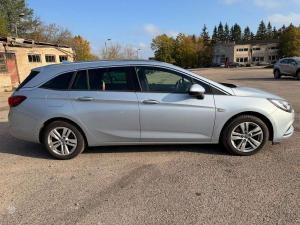 Grey Opel Astra 2016 in Raseiniai, with an engine capacity of 1.60 L and mileage of 280 thousand km for 4900 €, photo 6 on AUTOMOTO.COM.LV