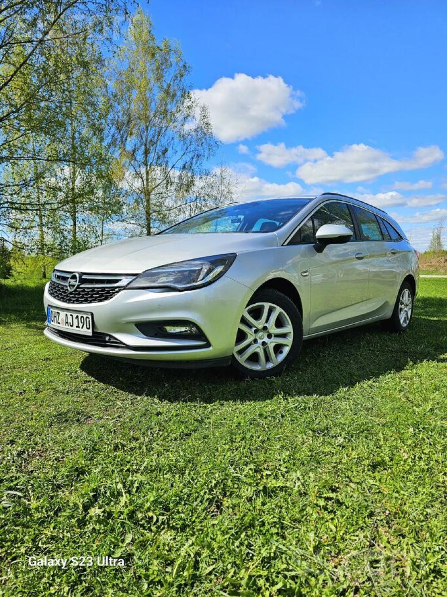 Grey Opel Astra 2017 in Rezekne, with an engine capacity of 1.60 L and mileage of 198 thousand km for 3450 €, photo 1 on AUTOMOTO.COM.LV