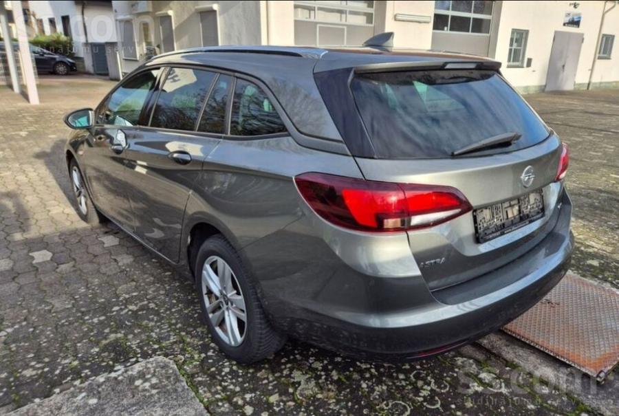 Grey Opel Astra 2017 in Daugavpils, with an engine capacity of 1.60 L and mileage of 230 thousand km for 5950 €, photo 1 on AUTOMOTO.COM.LV