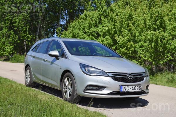 Grey Opel Astra 2017 in Riga, with an engine capacity of 1.60 L and mileage of 230 thousand km for 5700 €, photo 2 on AUTOMOTO.COM.LV