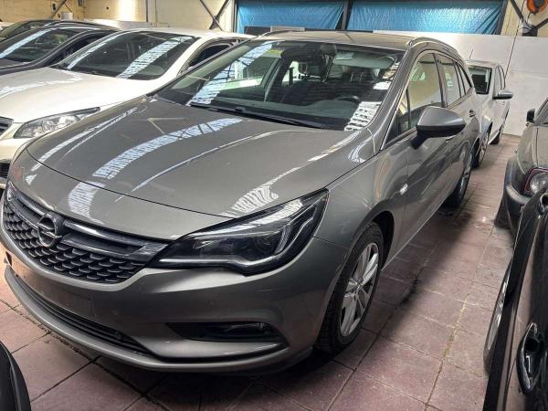 Grey Opel Astra 2017 in Siauliai, with an engine capacity of 1.60 L and mileage of 163 thousand km for 5600 €, photo 1 on AUTOMOTO.COM.LV