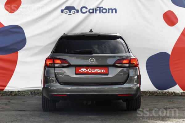 Grey Opel Astra 2017 in Riga, with an engine capacity of 1.60 L and mileage of 192 thousand km for 8650 €, photo 5 on AUTOMOTO.COM.LV