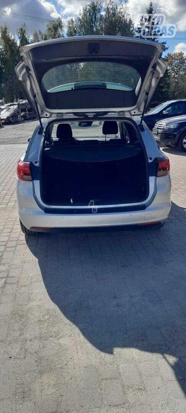 Grey Opel Astra 2017 in Radviliskis, with an engine capacity of 1.60 L and mileage of 217 thousand km for 5900 €, photo 7 on AUTOMOTO.COM.LV