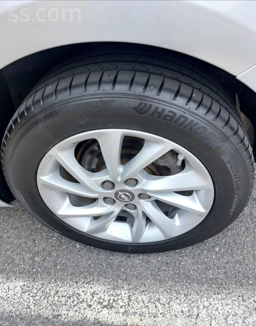 Grey Opel Astra 2017 in Riga, with an engine capacity of 1.40 L and mileage of 178 thousand km for 6990 €, photo 15 on AUTOMOTO.COM.LV