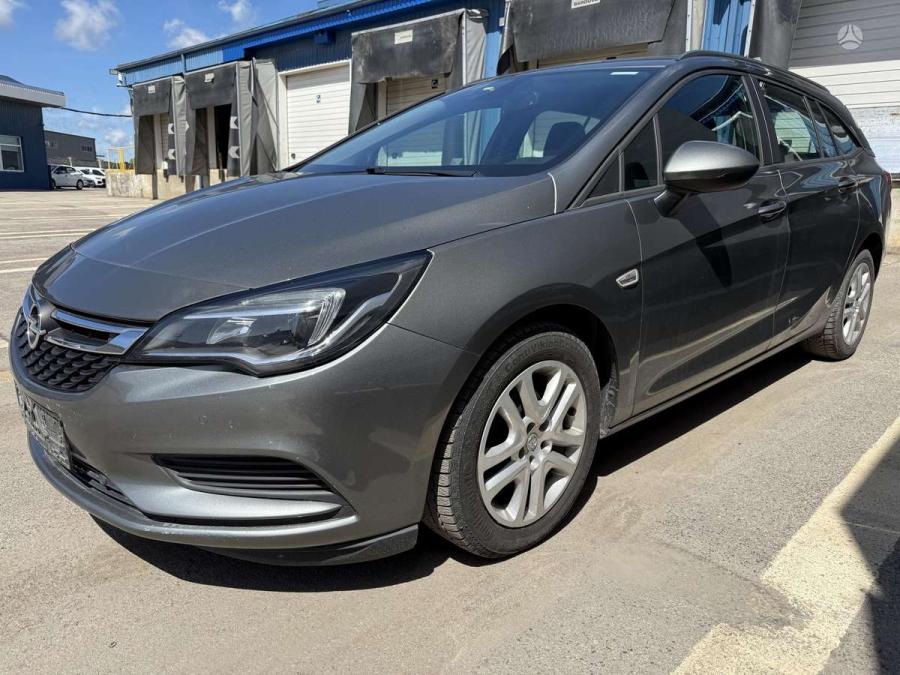 Grey Opel Astra 2018 in Klaipeda, with an engine capacity of 1.60 L and mileage of 203 thousand km for 5700 €, photo 1 on AUTOMOTO.COM.LV