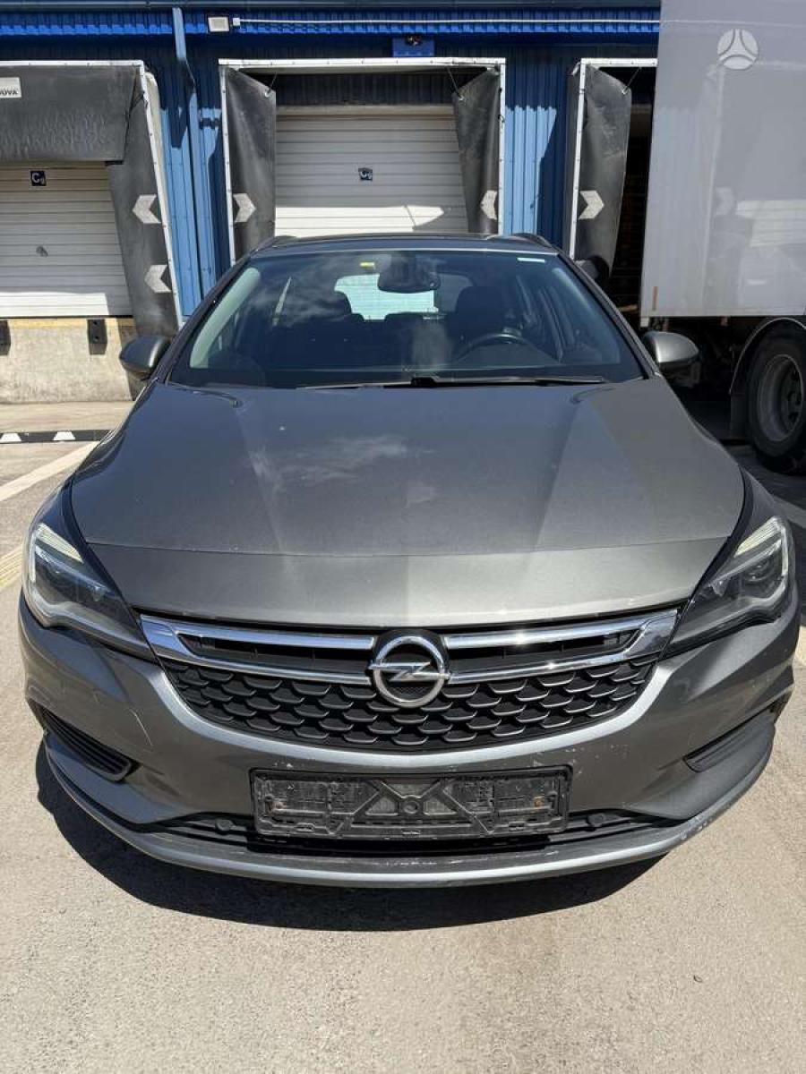 Grey Opel Astra 2018 in Klaipeda, with an engine capacity of 1.60 L and mileage of 203 thousand km for 5700 €, photo 4 on AUTOMOTO.COM.LV