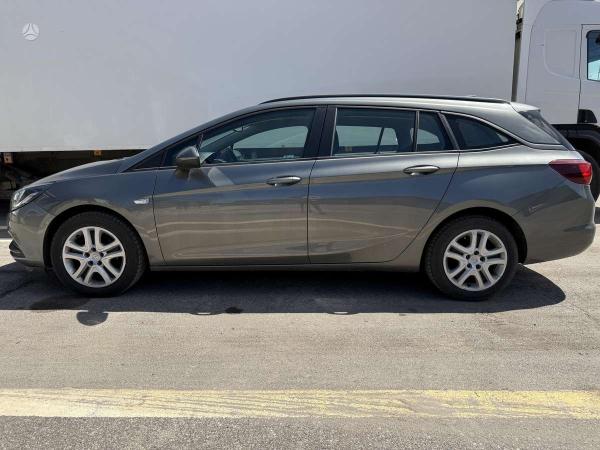 Grey Opel Astra 2018 in Klaipeda, with an engine capacity of 1.60 L and mileage of 203 thousand km for 5700 €, photo 5 on AUTOMOTO.COM.LV