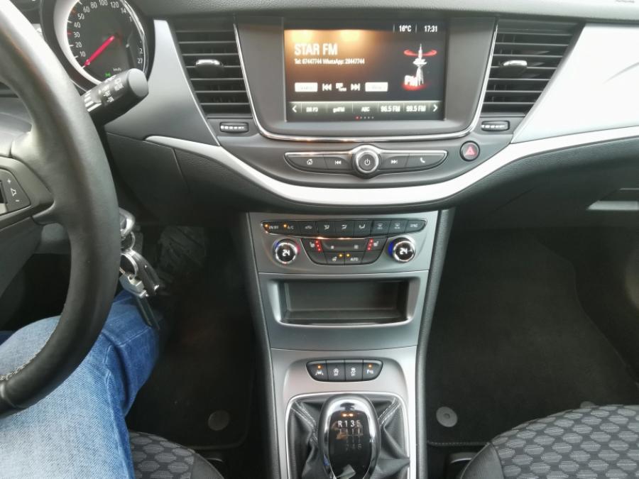 Grey Opel Astra 2018 in Riga, with an engine capacity of 1.60 L and mileage of 111 thousand km for 8790 €, photo 8 on AUTOMOTO.COM.LV