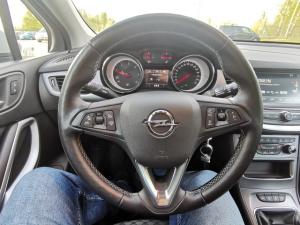Grey Opel Astra 2018 in Riga, with an engine capacity of 1.60 L and mileage of 111 thousand km for 8790 €, photo 12 on AUTOMOTO.COM.LV