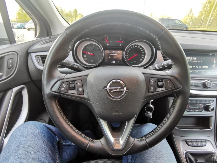 Grey Opel Astra 2018 in Riga, with an engine capacity of 1.60 L and mileage of 111 thousand km for 8790 €, photo 12 on AUTOMOTO.COM.LV