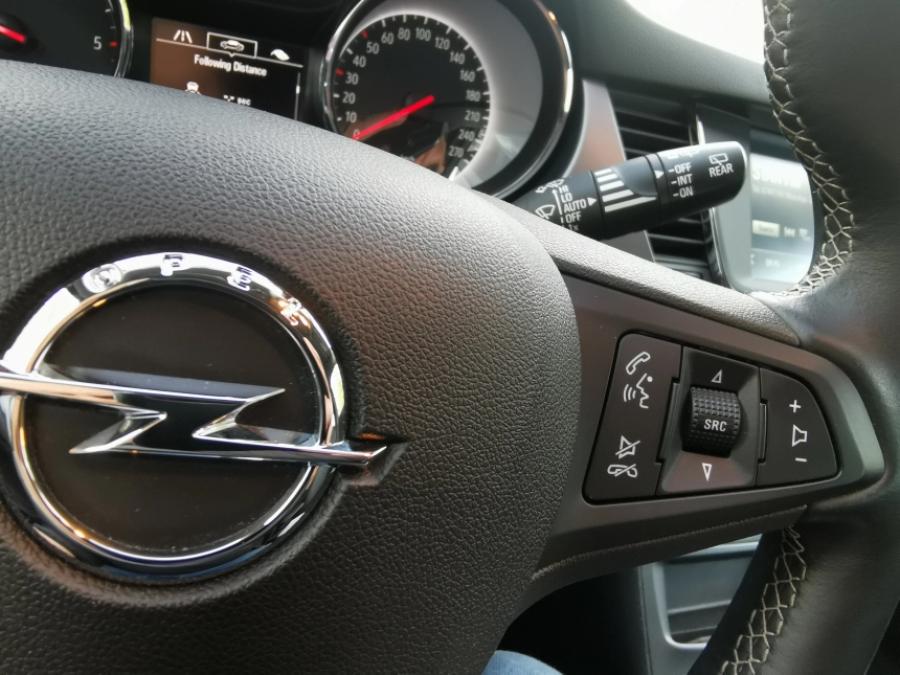 Grey Opel Astra 2018 in Riga, with an engine capacity of 1.60 L and mileage of 111 thousand km for 8790 €, photo 15 on AUTOMOTO.COM.LV