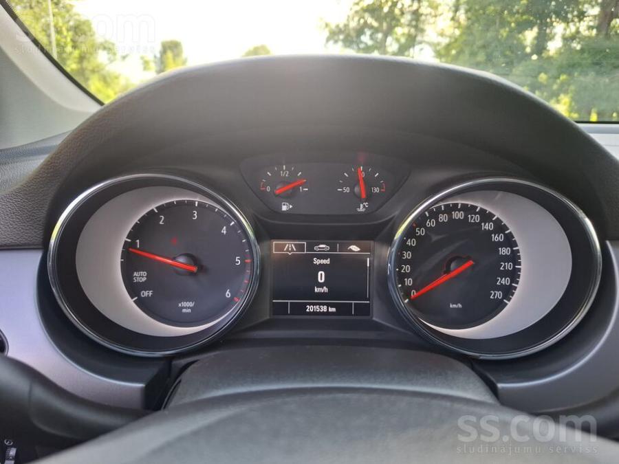 Grey Opel Astra 2018 in Riga, with an engine capacity of 1.60 L and mileage of 202 thousand km for 5600 €, photo 6 on AUTOMOTO.COM.LV