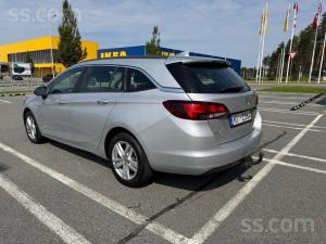 Grey Opel Astra 2018 in Riga, with an engine capacity of 1.60 L and mileage of 230 thousand km for 6490 €, photo 3 on AUTOMOTO.COM.LV