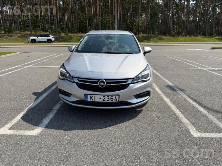 Grey Opel Astra 2018 in Riga, with an engine capacity of 1.60 L and mileage of 230 thousand km for 6490 €, photo 7 on AUTOMOTO.COM.LV