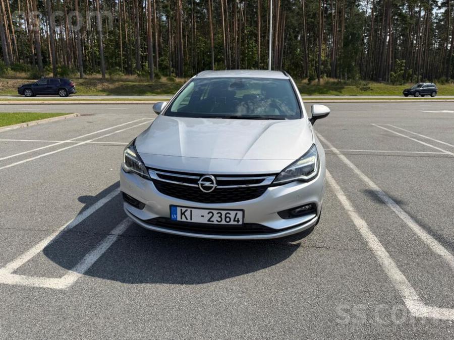Grey Opel Astra 2018 in Riga, with an engine capacity of 1.60 L and mileage of 230 thousand km for 6490 €, photo 8 on AUTOMOTO.COM.LV