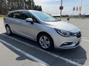 Grey Opel Astra 2018 in Riga, with an engine capacity of 1.60 L and mileage of 230 thousand km for 6490 €, photo 12 on AUTOMOTO.COM.LV