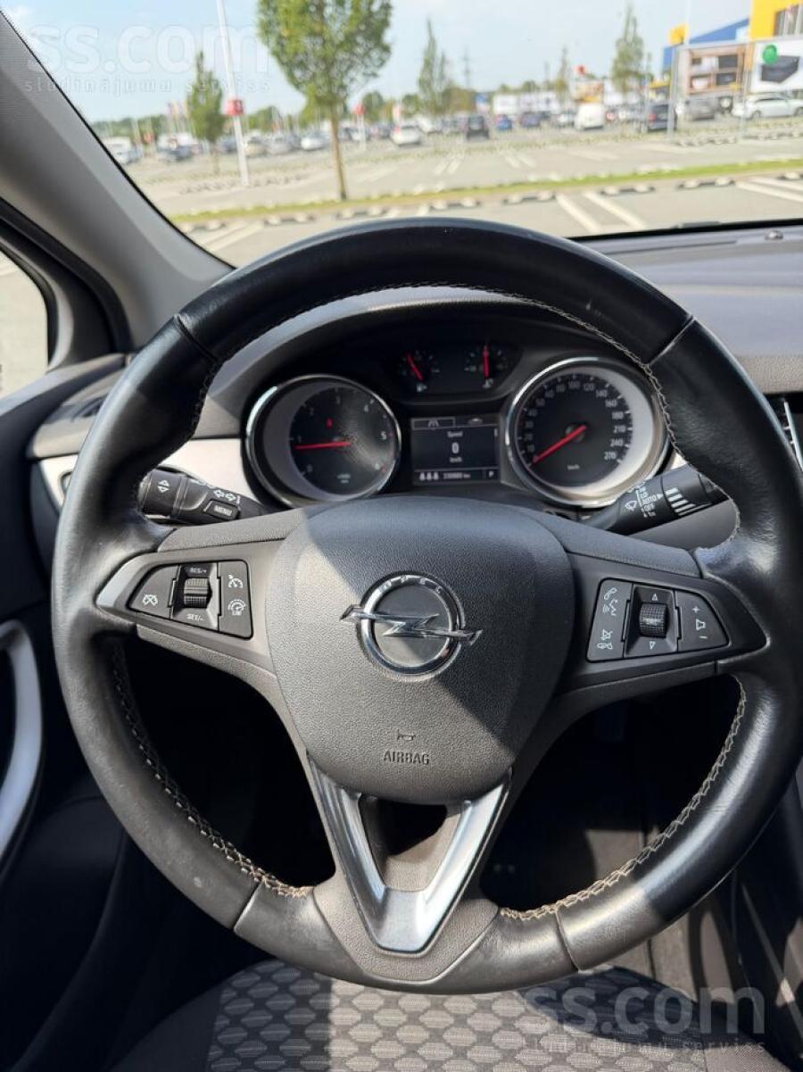 Grey Opel Astra 2018 in Riga, with an engine capacity of 1.60 L and mileage of 230 thousand km for 6490 €, photo 14 on AUTOMOTO.COM.LV