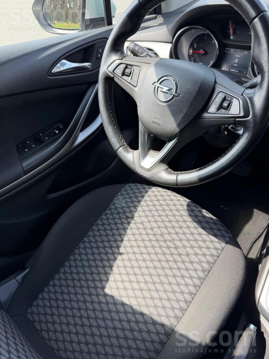 Grey Opel Astra 2018 in Riga, with an engine capacity of 1.60 L and mileage of 230 thousand km for 6490 €, photo 15 on AUTOMOTO.COM.LV