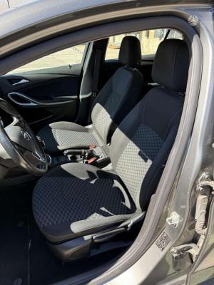Grey Opel Astra 2018 in Klaipeda, with an engine capacity of 1.60 L and mileage of 218 thousand km for 4900 €, photo 9 on AUTOMOTO.COM.LV