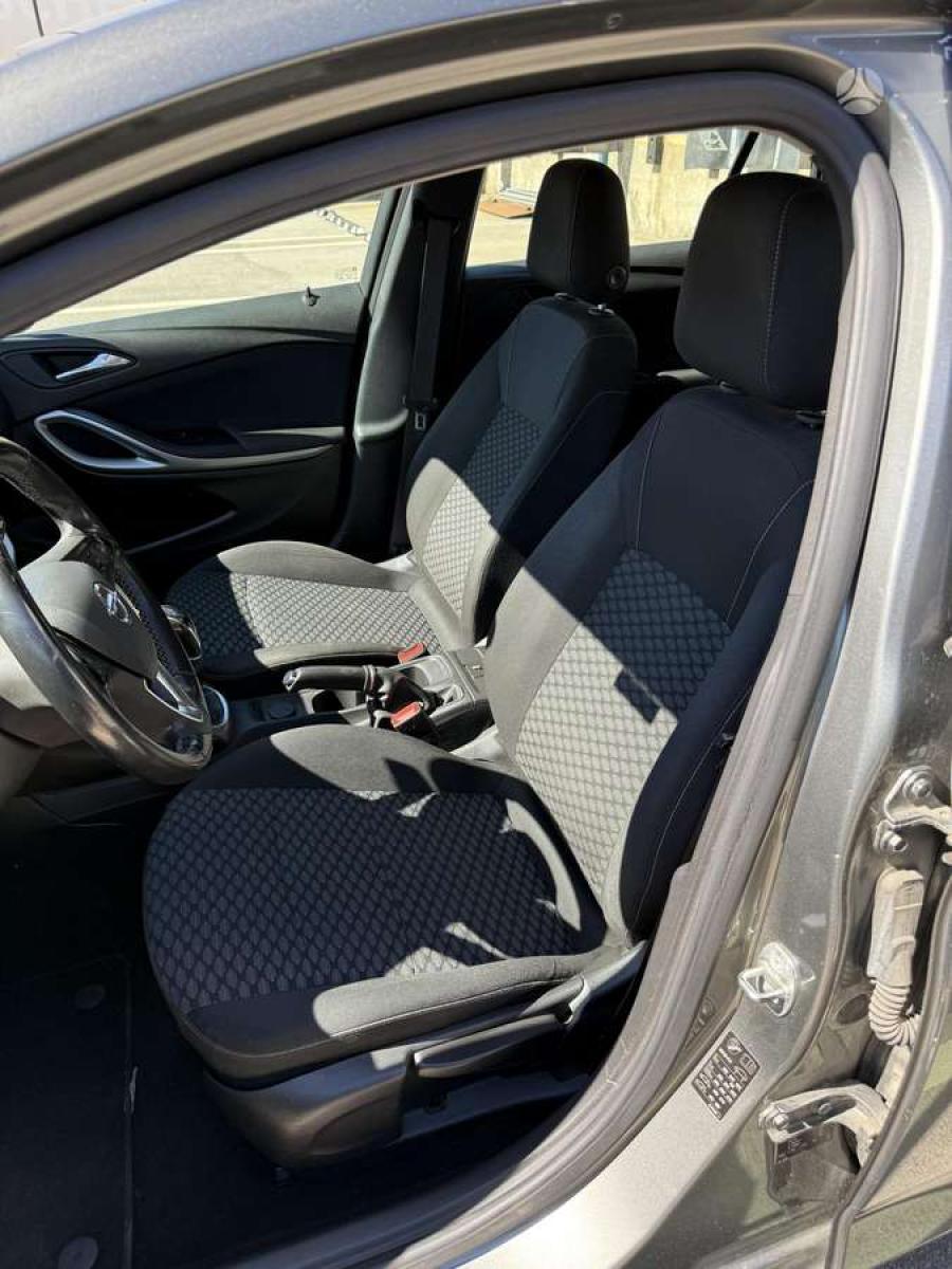 Grey Opel Astra 2018 in Klaipeda, with an engine capacity of 1.60 L and mileage of 218 thousand km for 4900 €, photo 9 on AUTOMOTO.COM.LV