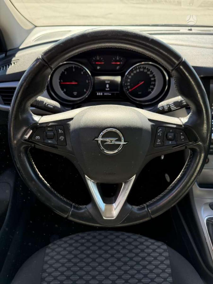 Grey Opel Astra 2018 in Klaipeda, with an engine capacity of 1.60 L and mileage of 218 thousand km for 4900 €, photo 11 on AUTOMOTO.COM.LV