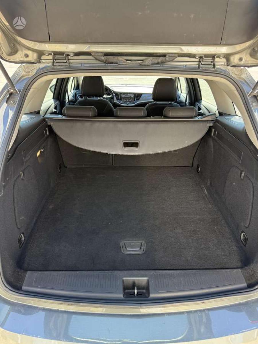Grey Opel Astra 2018 in Klaipeda, with an engine capacity of 1.60 L and mileage of 218 thousand km for 4900 €, photo 17 on AUTOMOTO.COM.LV