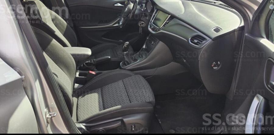 Grey Opel Astra 2018 in Riga, with an engine capacity of 1.60 L and mileage of 270 thousand km for 6500 €, photo 5 on AUTOMOTO.COM.LV