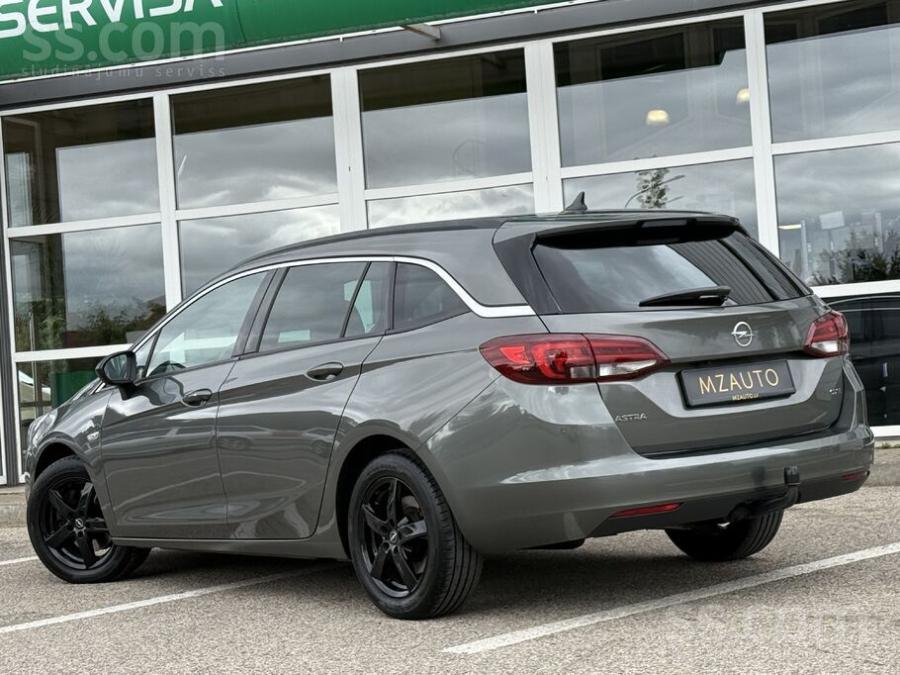 Grey Opel Astra 2019 in Tukums, with an engine capacity of 1.60 L and mileage of 245 thousand km for 7990 €, photo 3 on AUTOMOTO.COM.LV