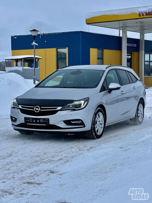 Grey Opel Astra 2019 in Kretinga, with an engine capacity of 1.60 L and mileage of 176 thousand km for 6999 €, photo 1 on AUTOMOTO.COM.LV