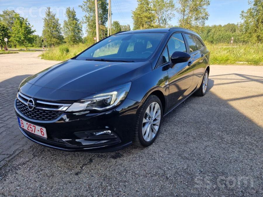 Grey Opel Astra 2019 in Ogre, with an engine capacity of 1.60 L and mileage of 207 thousand km for 8450 €, photo 1 on AUTOMOTO.COM.LV