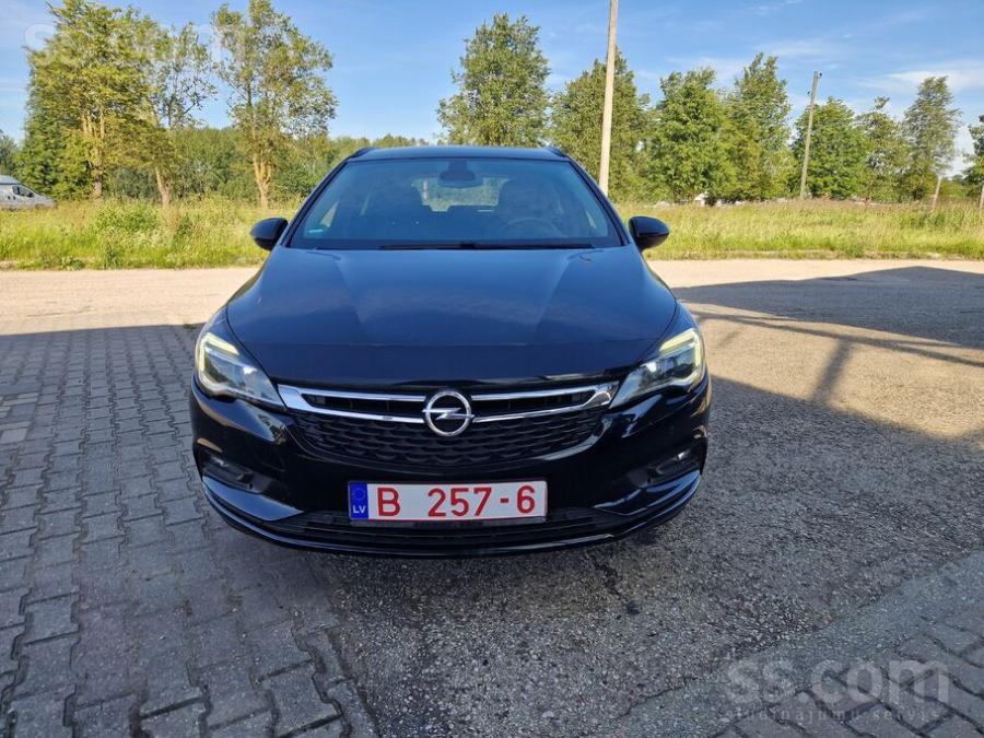 Grey Opel Astra 2019 in Ogre, with an engine capacity of 1.60 L and mileage of 207 thousand km for 8450 €, photo 6 on AUTOMOTO.COM.LV