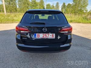 Grey Opel Astra 2019 in Ogre, with an engine capacity of 1.60 L and mileage of 207 thousand km for 8450 €, photo 7 on AUTOMOTO.COM.LV