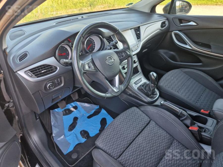 Grey Opel Astra 2019 in Ogre, with an engine capacity of 1.60 L and mileage of 207 thousand km for 8450 €, photo 19 on AUTOMOTO.COM.LV