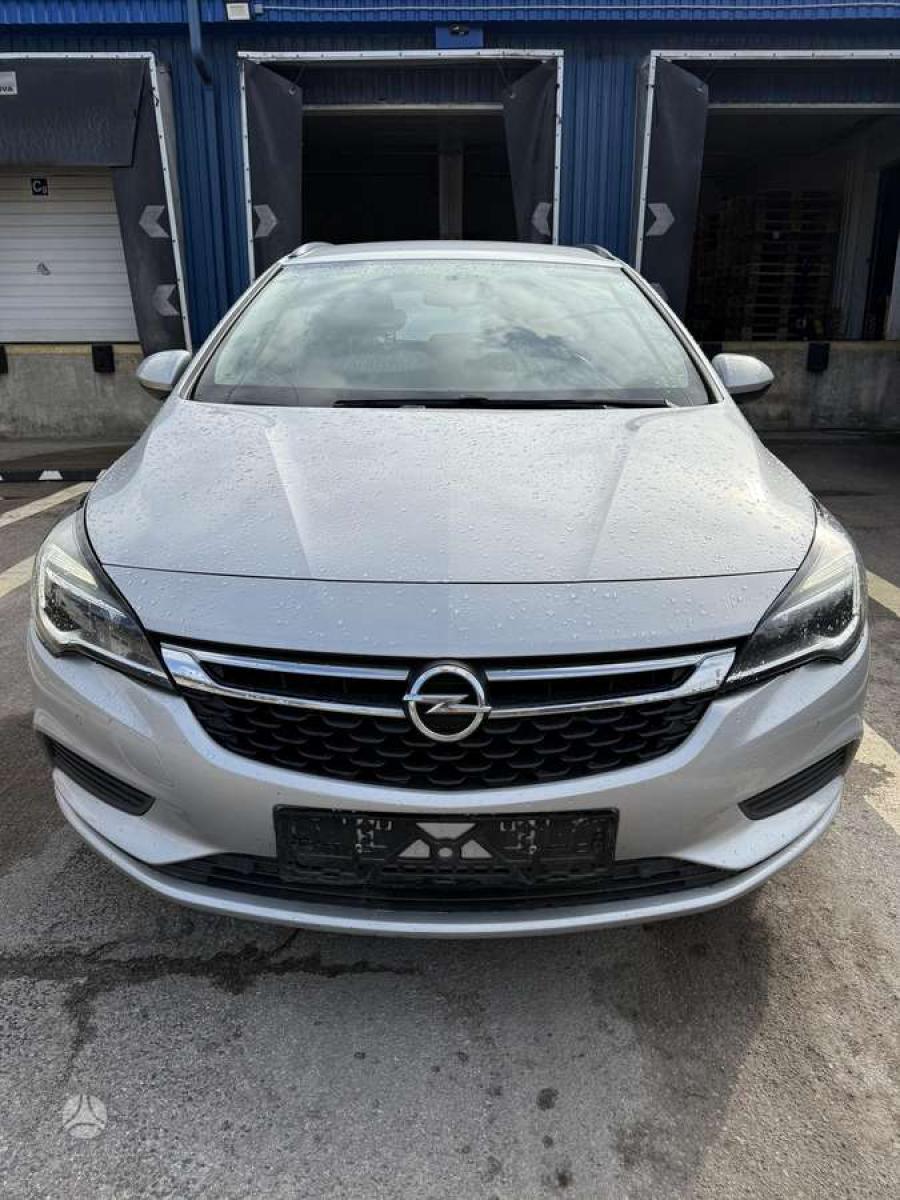 Grey Opel Astra 2019 in Klaipeda, with an engine capacity of 1.60 L and mileage of 180 thousand km for 7300 €, photo 3 on AUTOMOTO.COM.LV
