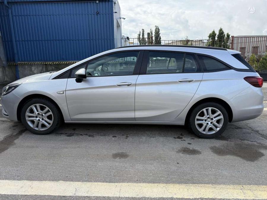 Grey Opel Astra 2019 in Klaipeda, with an engine capacity of 1.60 L and mileage of 180 thousand km for 7300 €, photo 6 on AUTOMOTO.COM.LV