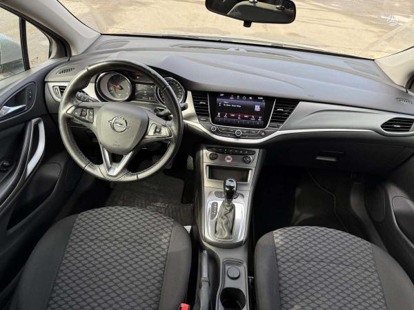 Grey Opel Astra 2019 in Klaipeda, with an engine capacity of 1.60 L and mileage of 180 thousand km for 7300 €, photo 9 on AUTOMOTO.COM.LV