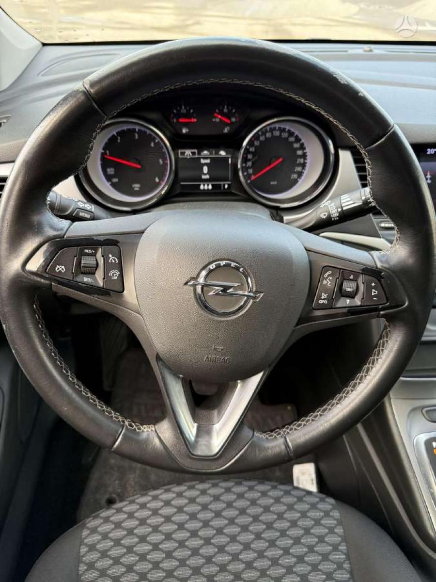 Grey Opel Astra 2019 in Klaipeda, with an engine capacity of 1.60 L and mileage of 180 thousand km for 7300 €, photo 11 on AUTOMOTO.COM.LV