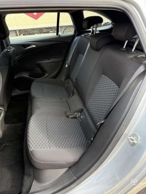 Grey Opel Astra 2019 in Klaipeda, with an engine capacity of 1.60 L and mileage of 180 thousand km for 7300 €, photo 18 on AUTOMOTO.COM.LV