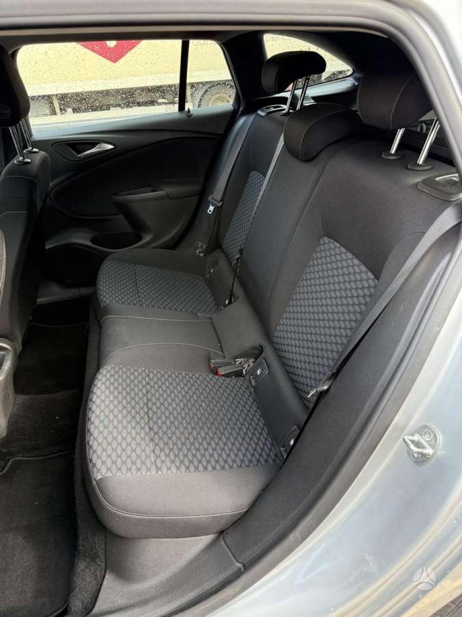 Grey Opel Astra 2019 in Klaipeda, with an engine capacity of 1.60 L and mileage of 180 thousand km for 7300 €, photo 18 on AUTOMOTO.COM.LV