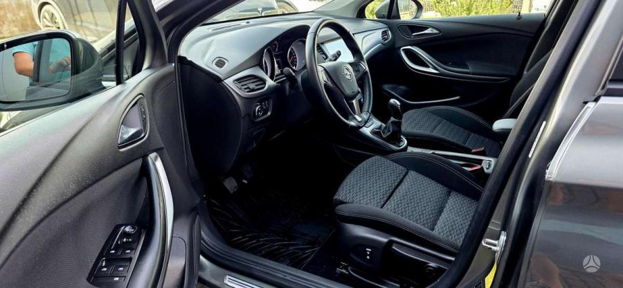 Grey Opel Astra 2019 in Siauliai, with an engine capacity of 1.60 L and mileage of 127 thousand km for 7950 €, photo 19 on AUTOMOTO.COM.LV