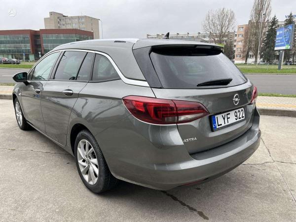 Grey Opel Astra 2020 in Klaipeda, with an engine capacity of 1.34 L and mileage of 88 thousand km for 11900 €, photo 4 on AUTOMOTO.COM.LV