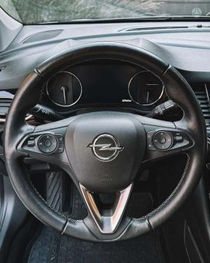 Grey Opel Astra 2020 in Klaipeda, with an engine capacity of 1.50 L and mileage of 88 thousand km for 8999 €, photo 14 on AUTOMOTO.COM.LV