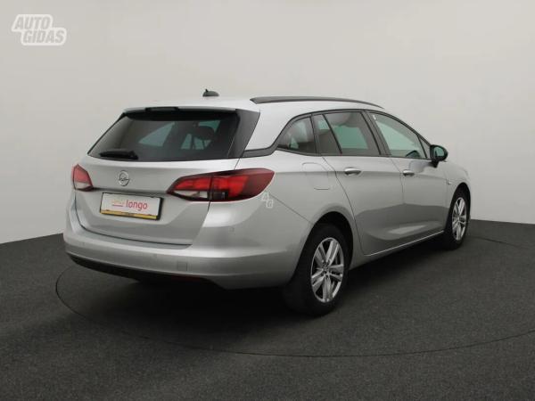 Grey Opel Astra 2021 in Vilnius, with an engine capacity of 1.40 L and mileage of 199 thousand km for 9899 €, photo 8 on AUTOMOTO.COM.LV
